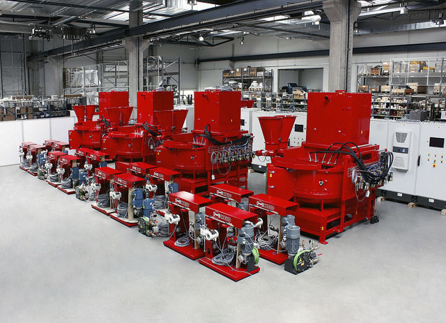 Machine de traitement de semences avec système d'enrobage ...