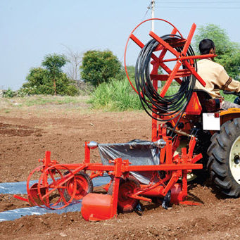 Semi-automatic plastic mulch layer - VST Tillers Tractors Ltd.