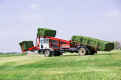 Round bale stacker - 6500 - Stinger, Inc. - rectangular / self-propelled