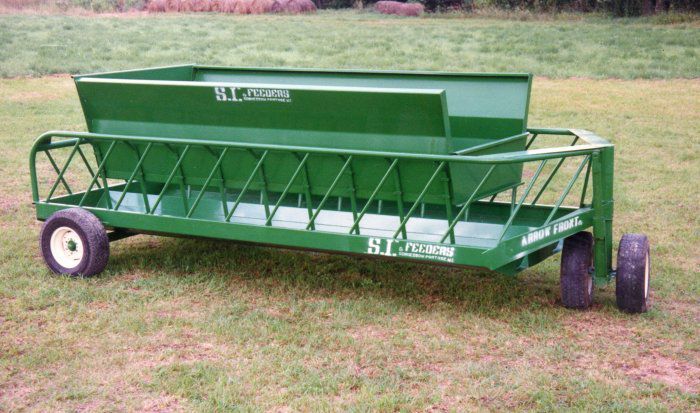 Cattle feeder - Arrow Front® - S.I. Feeders - metal / trailer-mounted