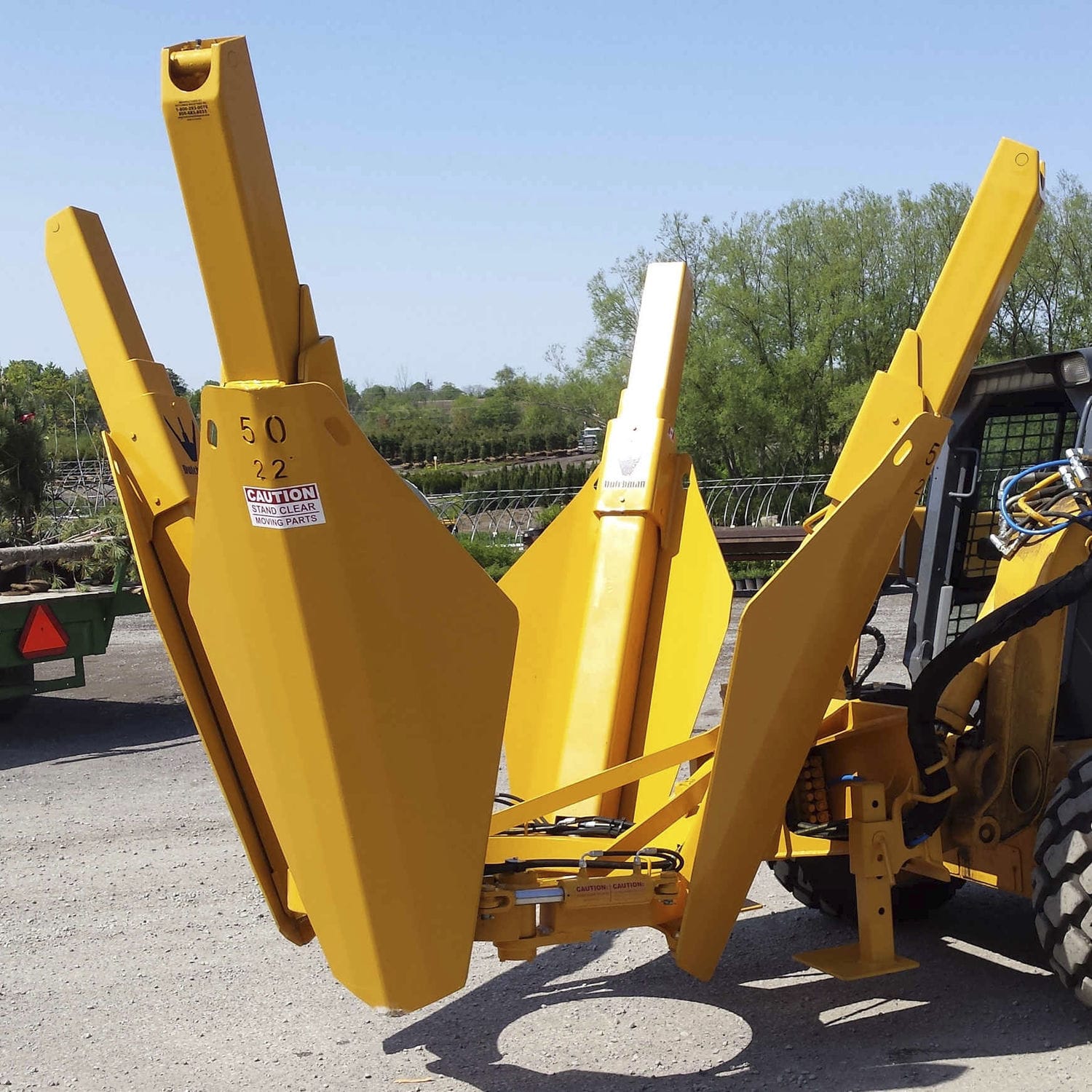 Skid steer loader tree spade - Dutchman Industries - tractor mounted