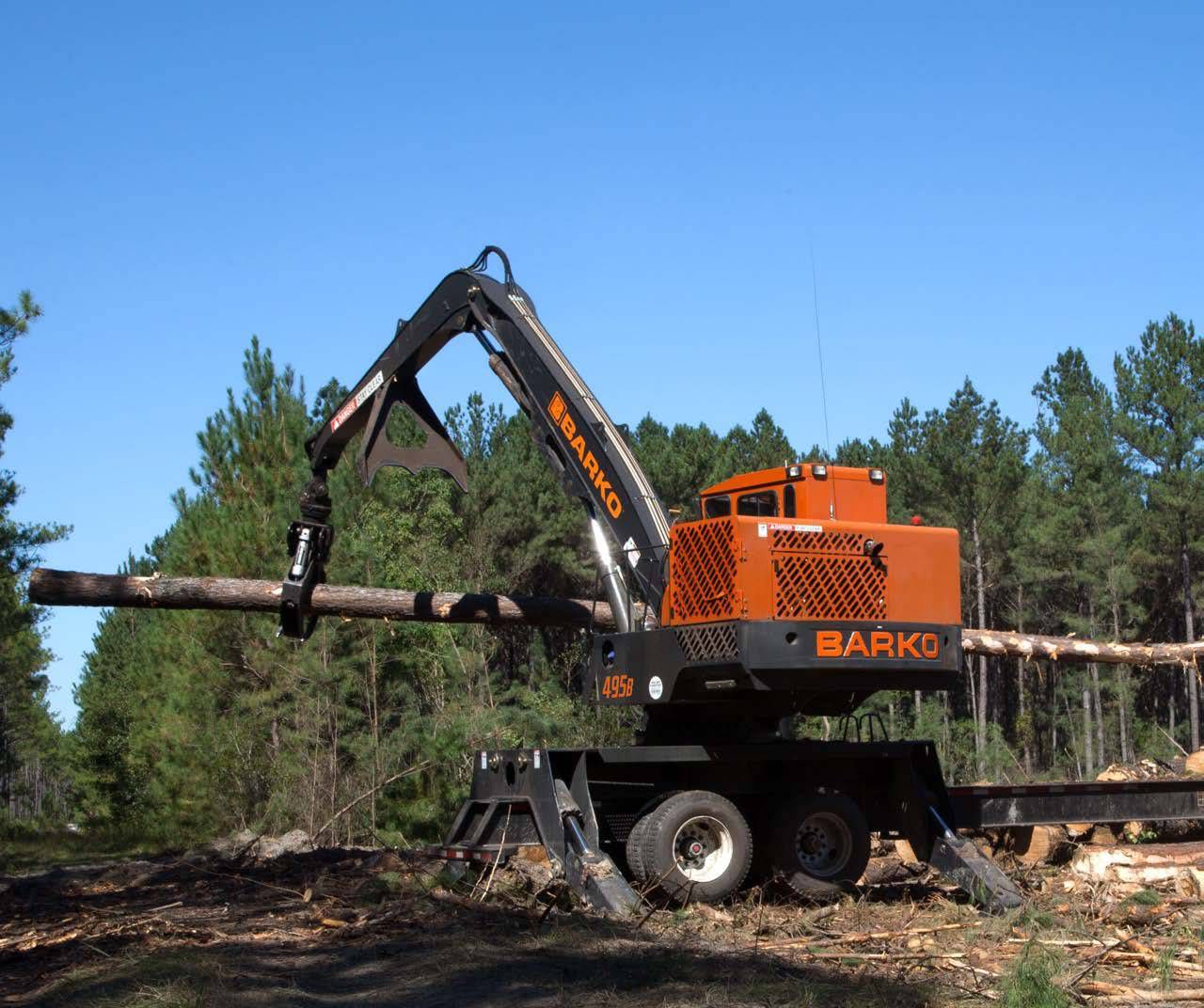 Trailer-mounted log loader - 495B - barko - knuckle boom