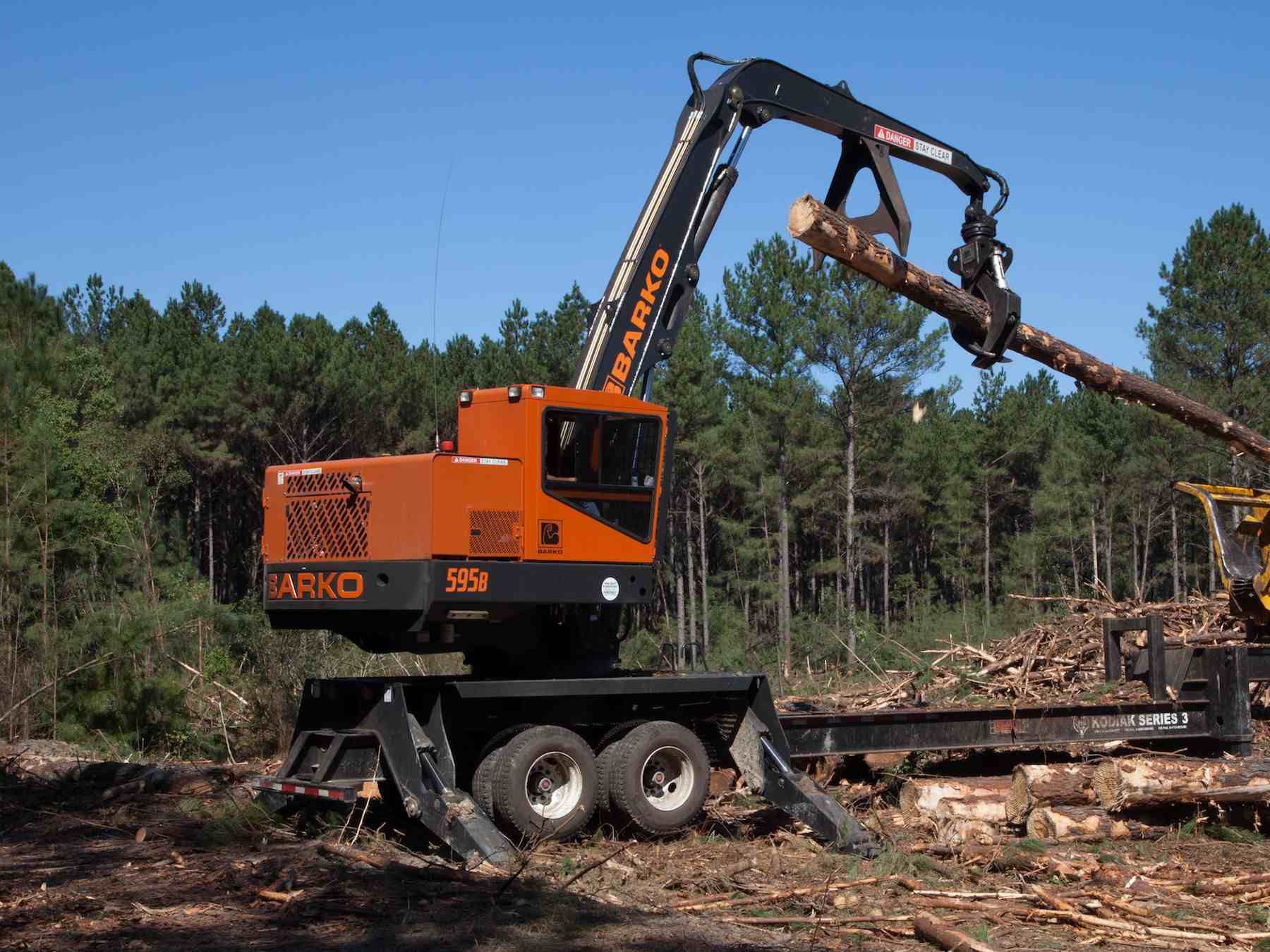 Trailer-mounted log loader - 595B - barko - knuckle boom