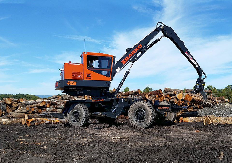 Trailer-mounted log loader - 495B RTC - barko - knuckle boom