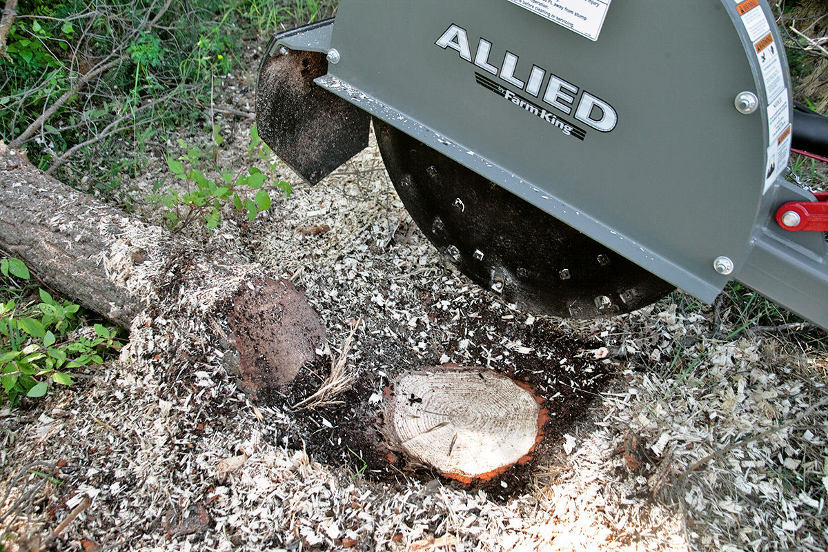 Tractor-mounted stump grinder / for skid steer loaders / hydraulic ...