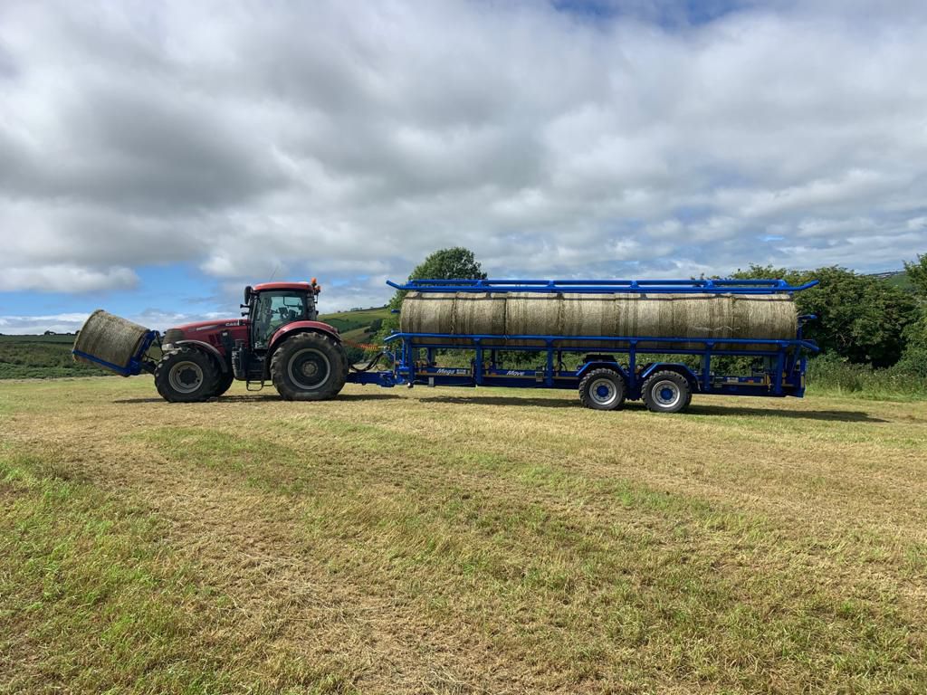 Round bale loader - Mega Move 14 - Wilson Engineering - self-unloading