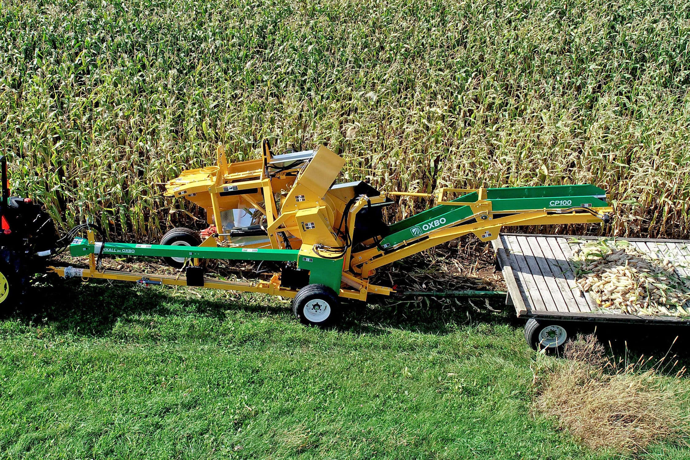 Corn harvester machine - CP100 - Oxbo - sweet corn / towed / 1-row